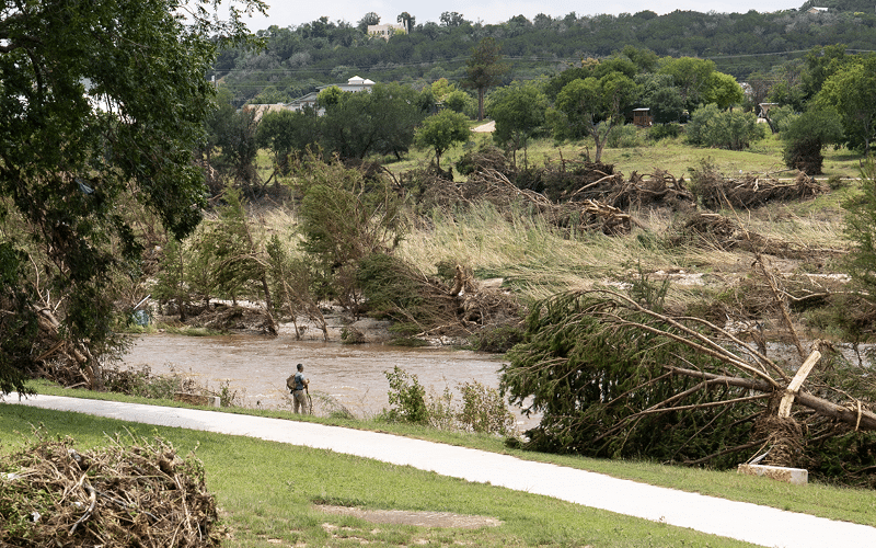 A son's desperate search for his parents after flood washed away their ...
